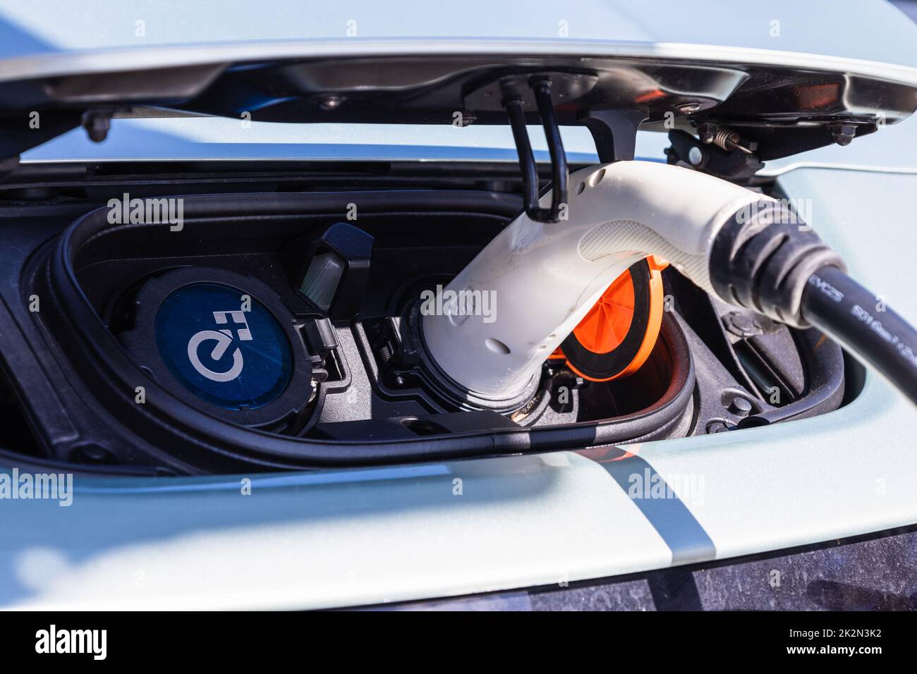 Plugged into ev charger hi-res stock photography and images - Alamy