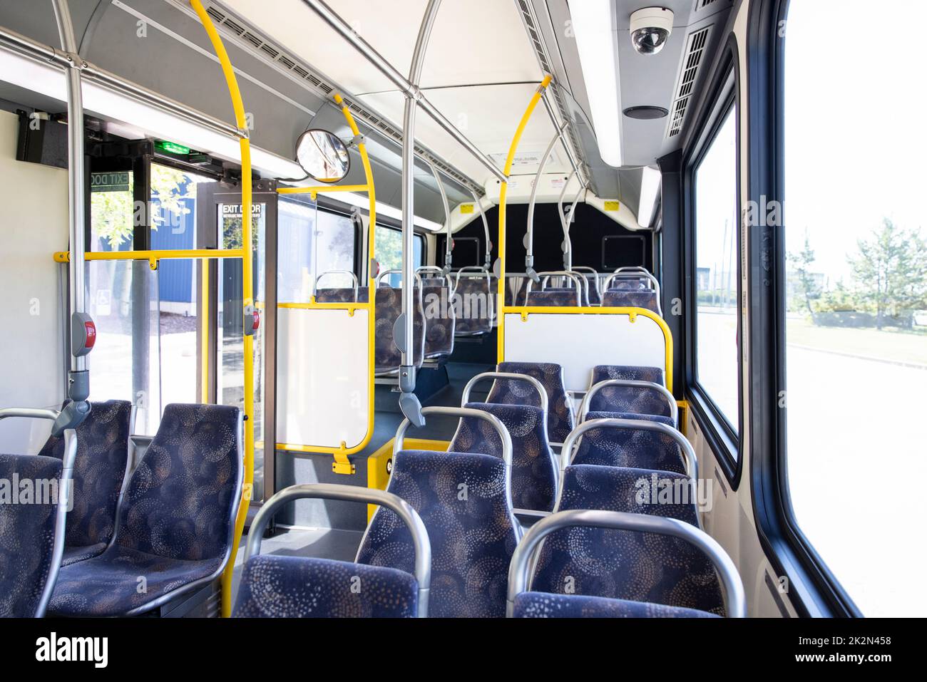 Seats in empty public bus Stock Photo - Alamy