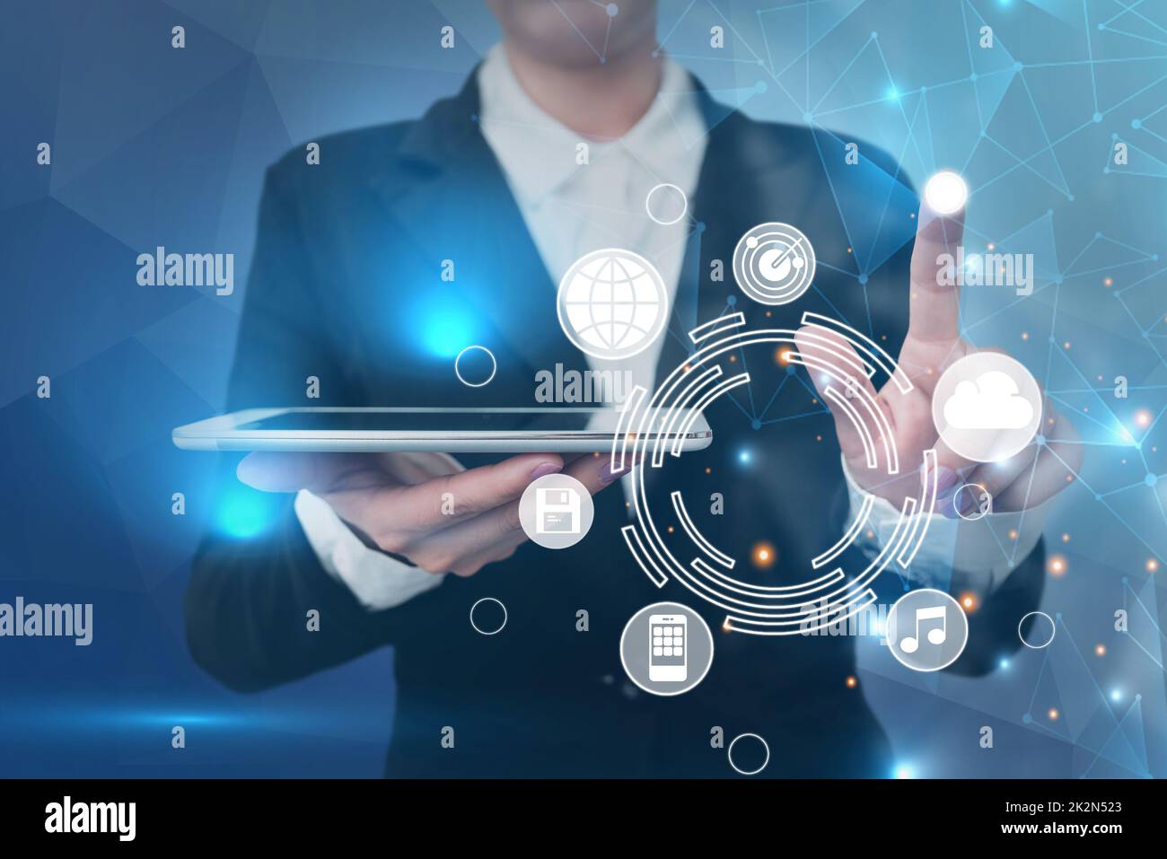 Lady in suit holding tablet symbolizing successful teamwork ...