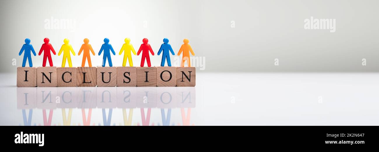 Human Figures Standing On Wooden Cubic Blocks Stock Photo - Alamy