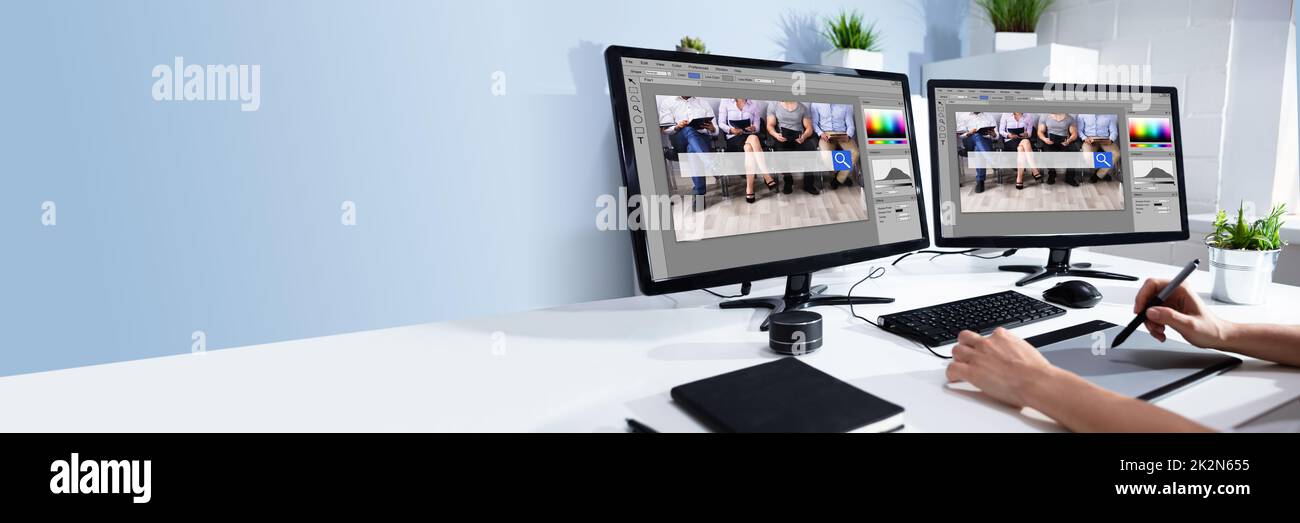 Female Editor Working With Photos On Computer Stock Photo - Alamy