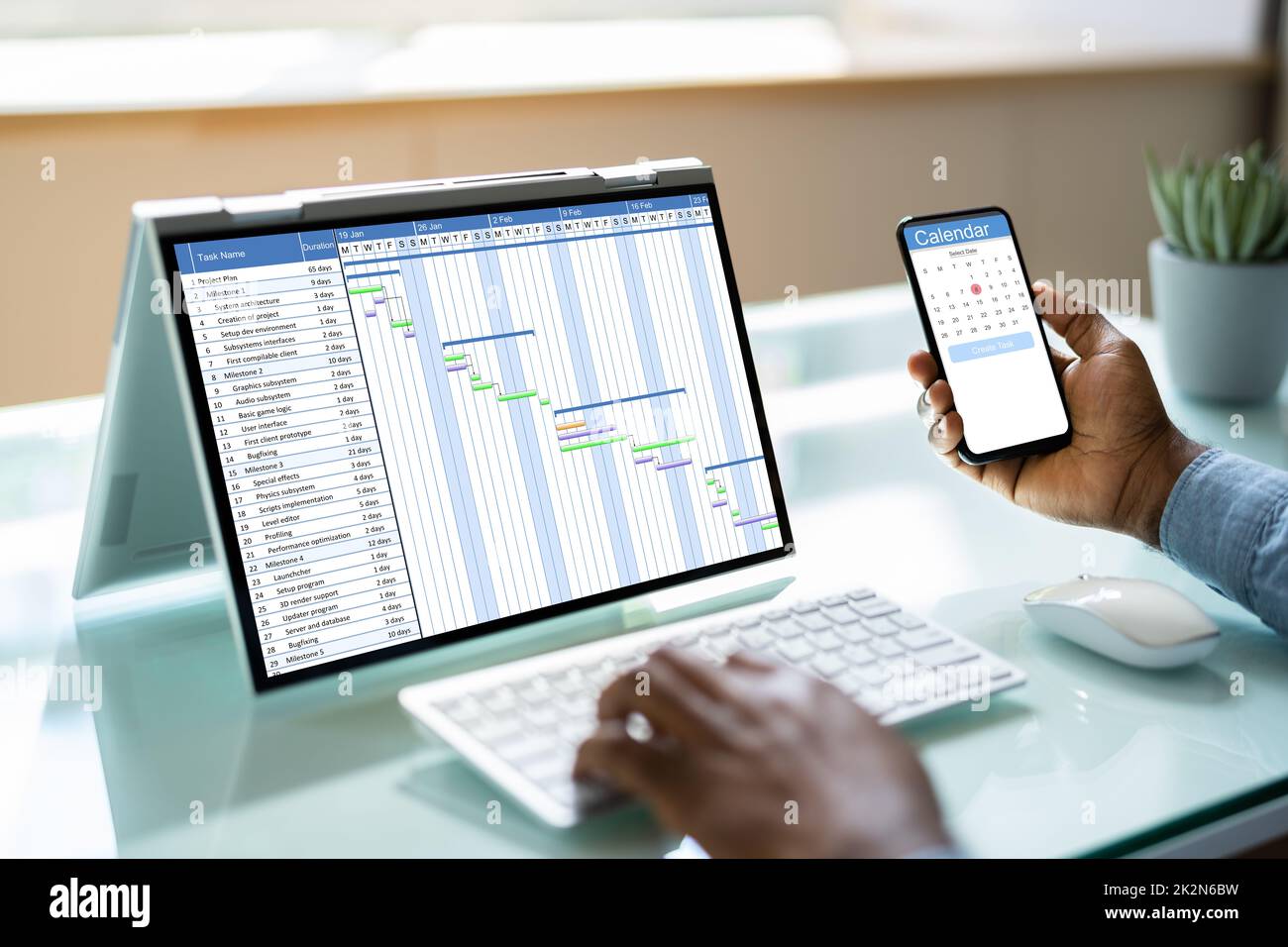 Scheduling Plan Using Cloud Software Stock Photo - Alamy