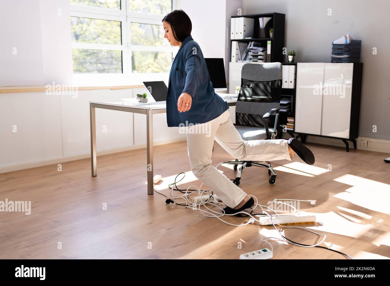 Stumble And Fall Over Wire Stock Photo - Alamy