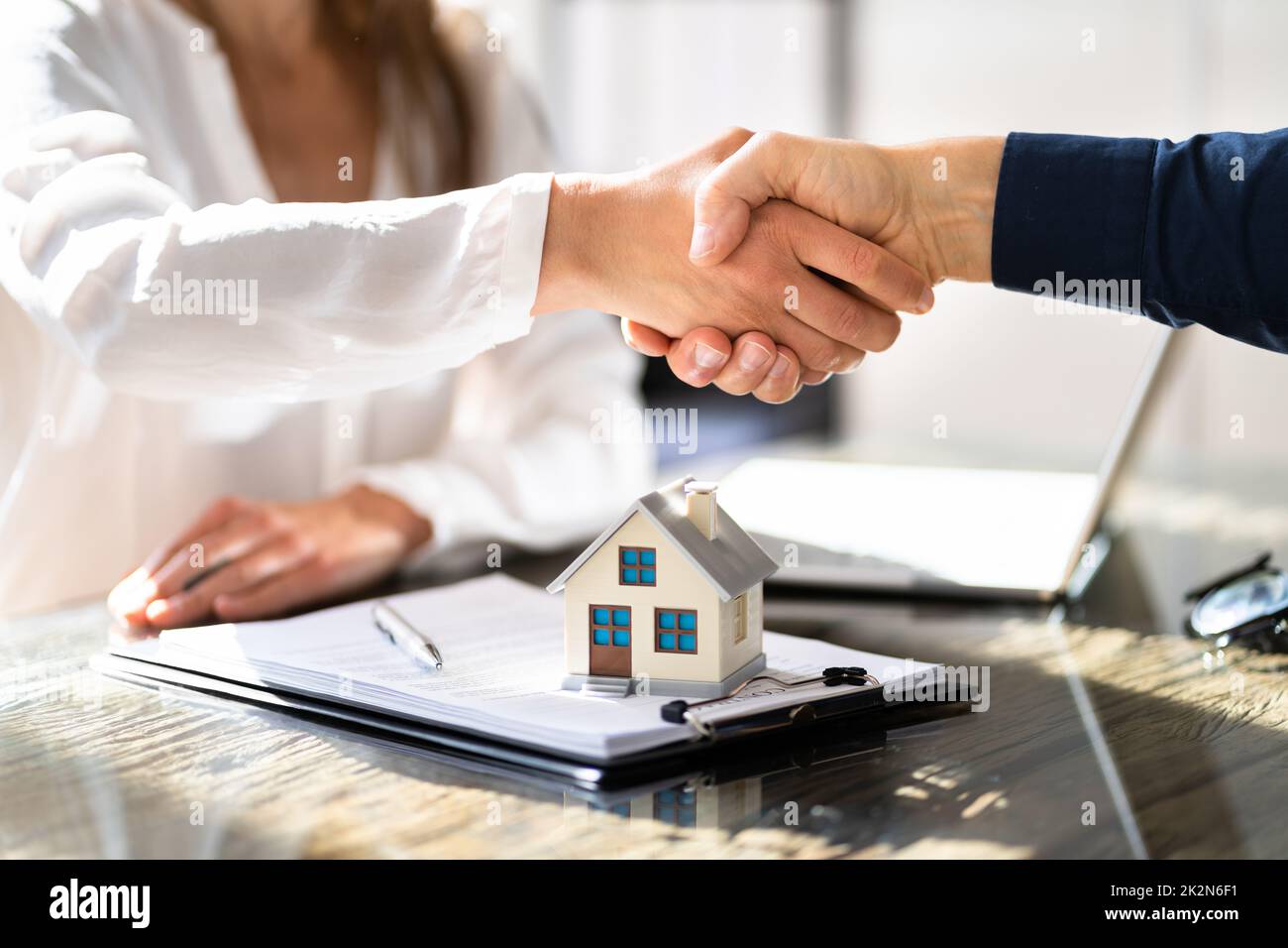 Real Estate House Investment. Handshake With Realtor Stock Photo - Alamy
