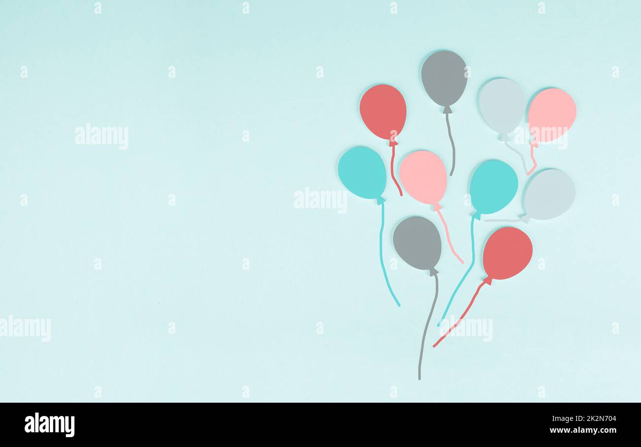 Colorful ballons on a blue colored background, children birthday ...