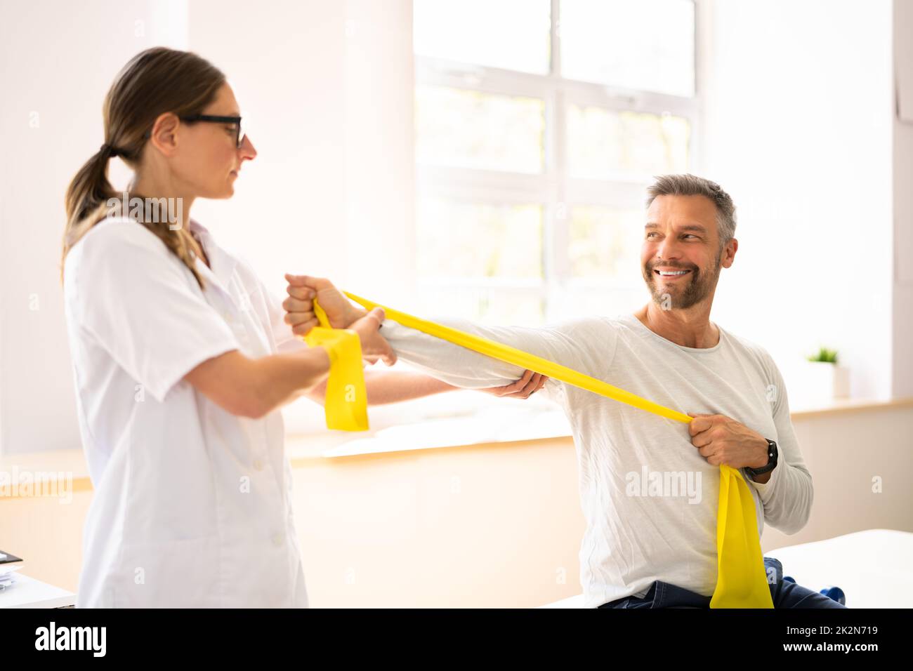 Band Resistance Physical Shoulder Exercise Stock Photo - Alamy