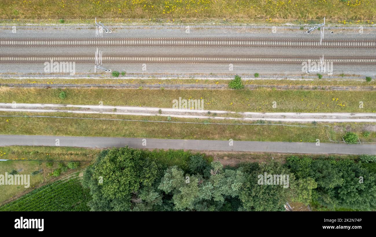 Aerial view of railway through countryside landscape, top down ...