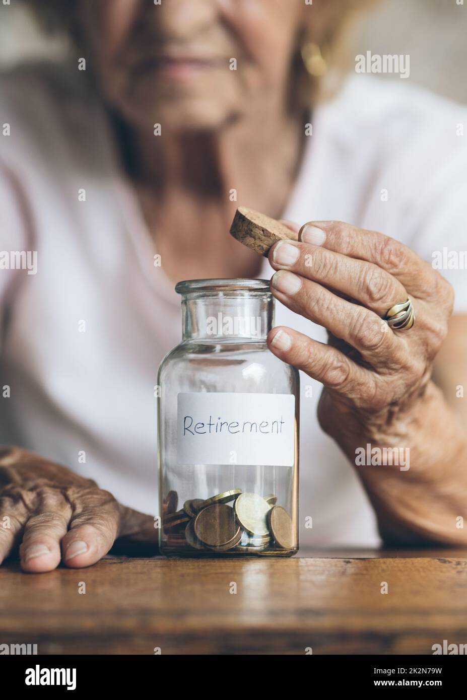 Elderly retired woman and her savings Stock Photo - Alamy