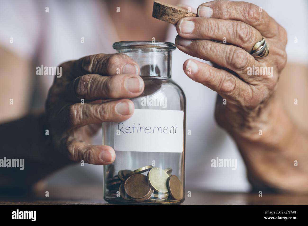 Elderly retired woman and her savings Stock Photo - Alamy
