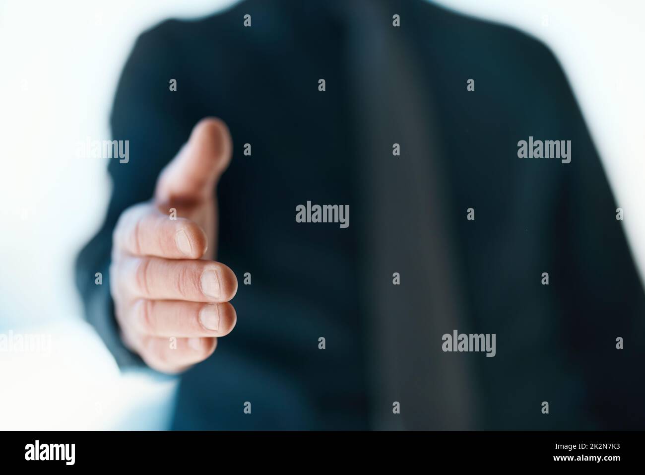 Giving you a warm welcome. Cropped shot of an unrecognizable ...