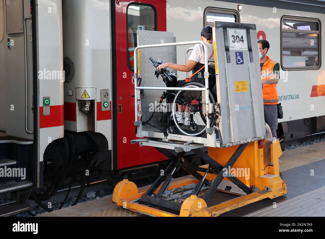 Naples, Italy - September 21, 2022: In the train station a disabled ...