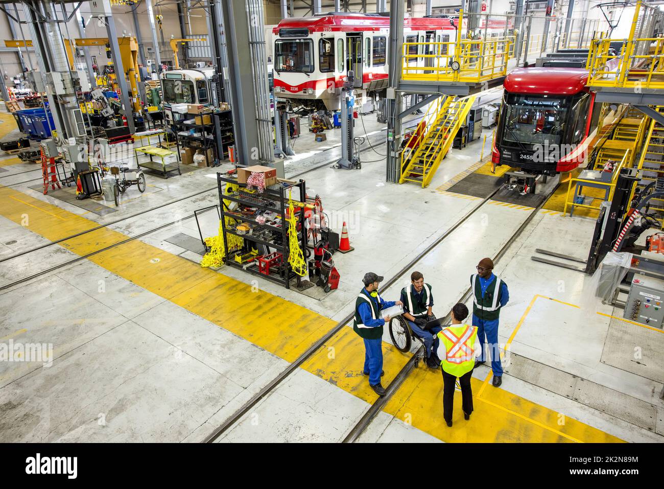 Transit engineers and supervisor meeting in maintenance facility Stock ...