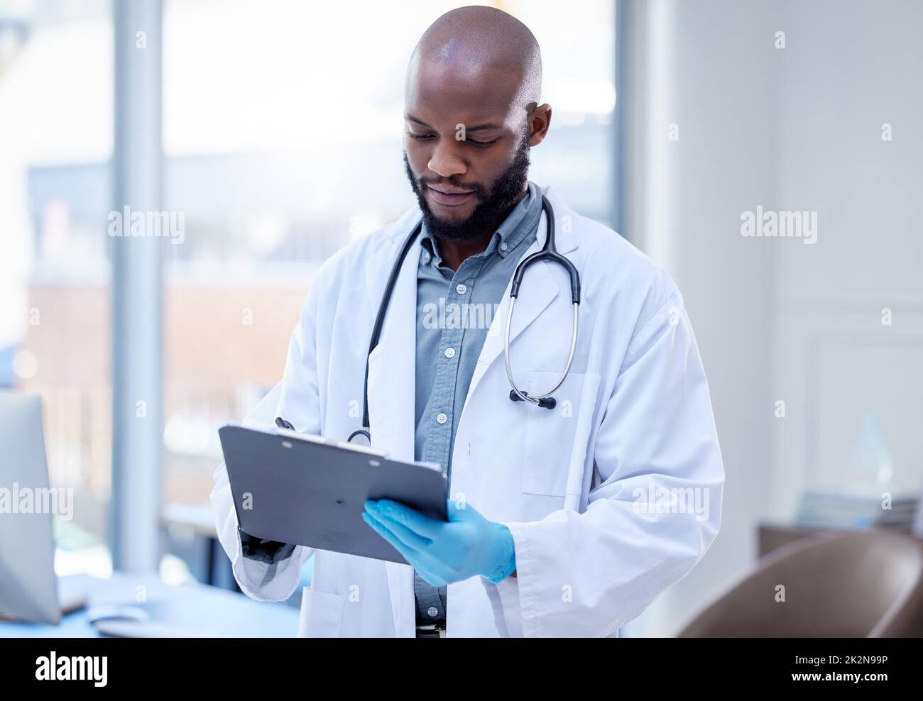 I have to hand this treatment plan over to the nurse. Shot of a male ...