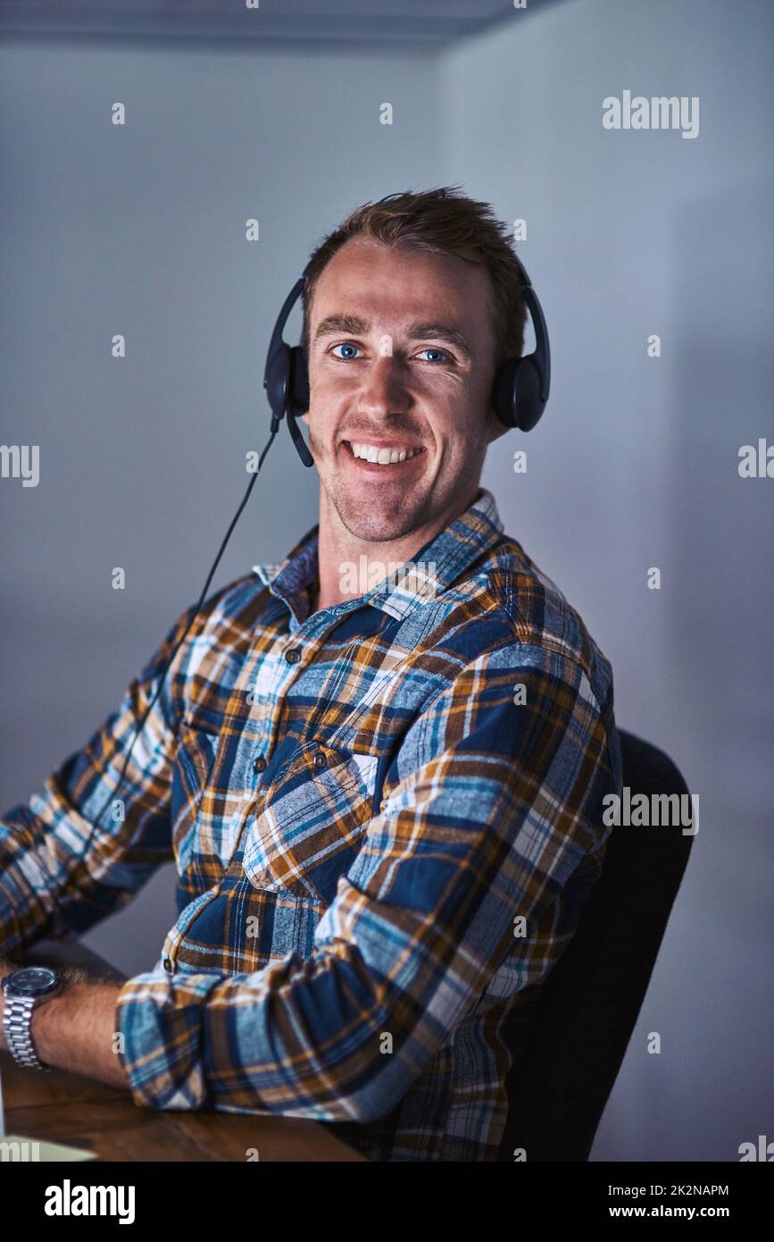 Hello, operator. Portrait of a happy customer service agent wearing a ...