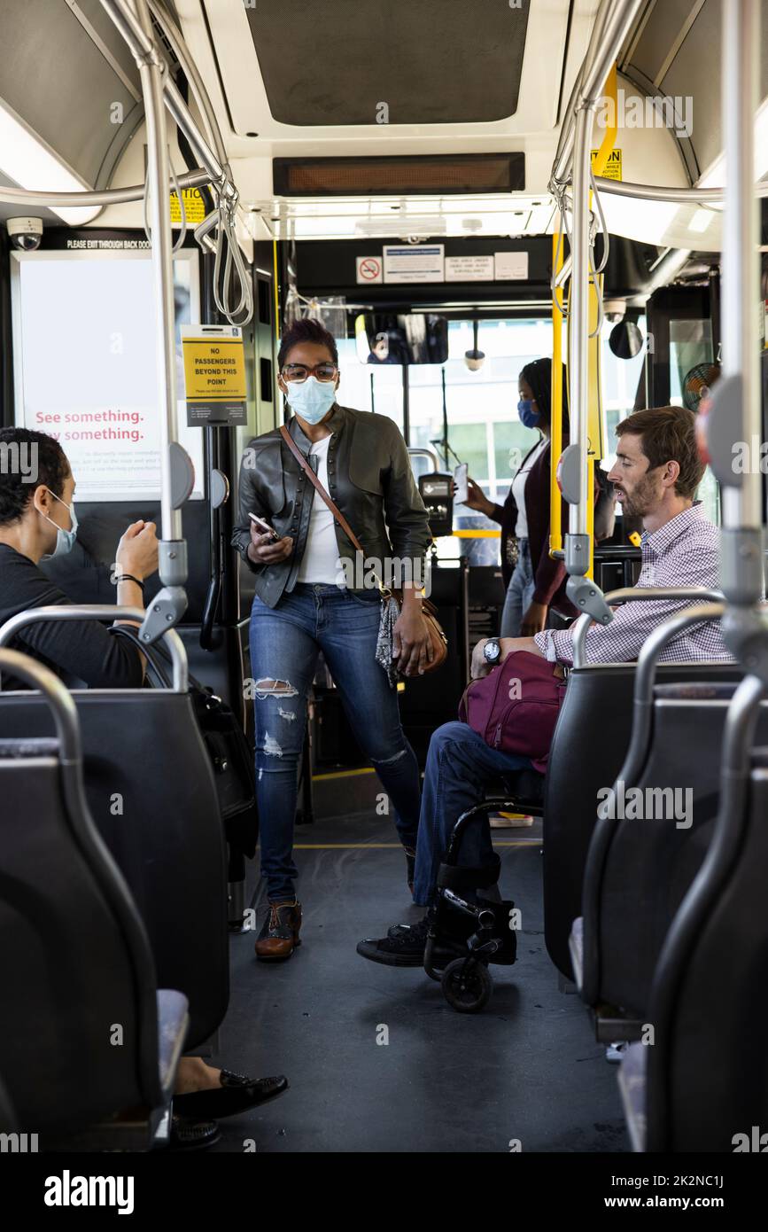 Group of people boarding bus hi-res stock photography and images - Alamy