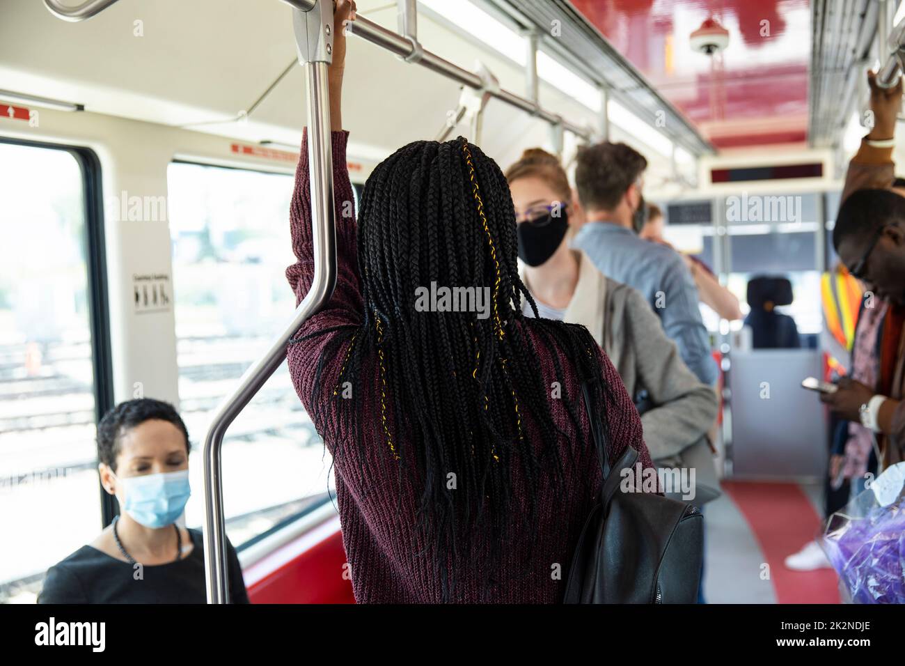 Passengers sitting face to face hi-res stock photography and images - Alamy