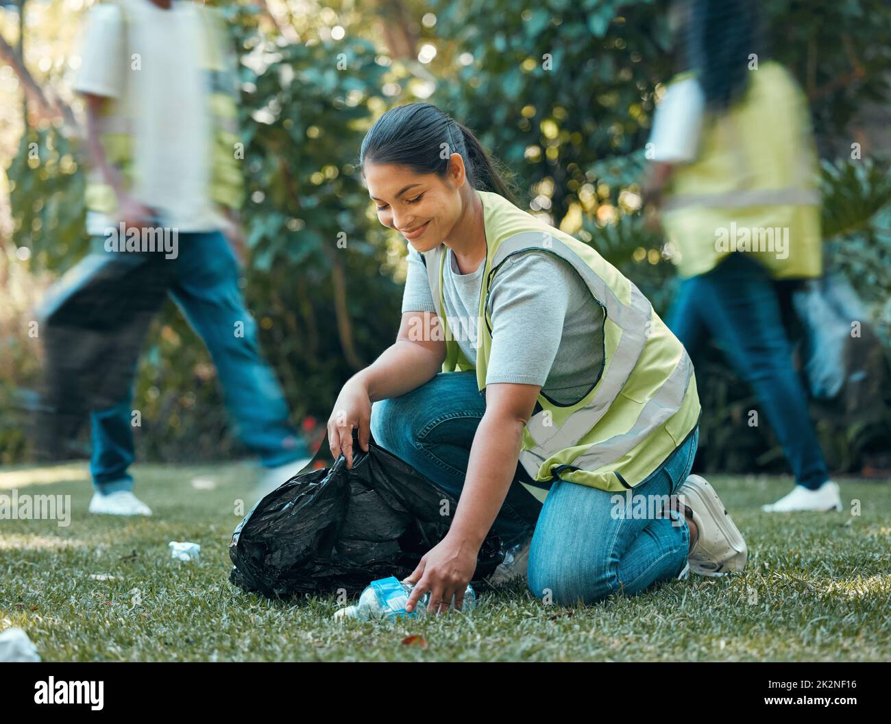 Volunteer, recycle pollution cleaning charity group working together to ...