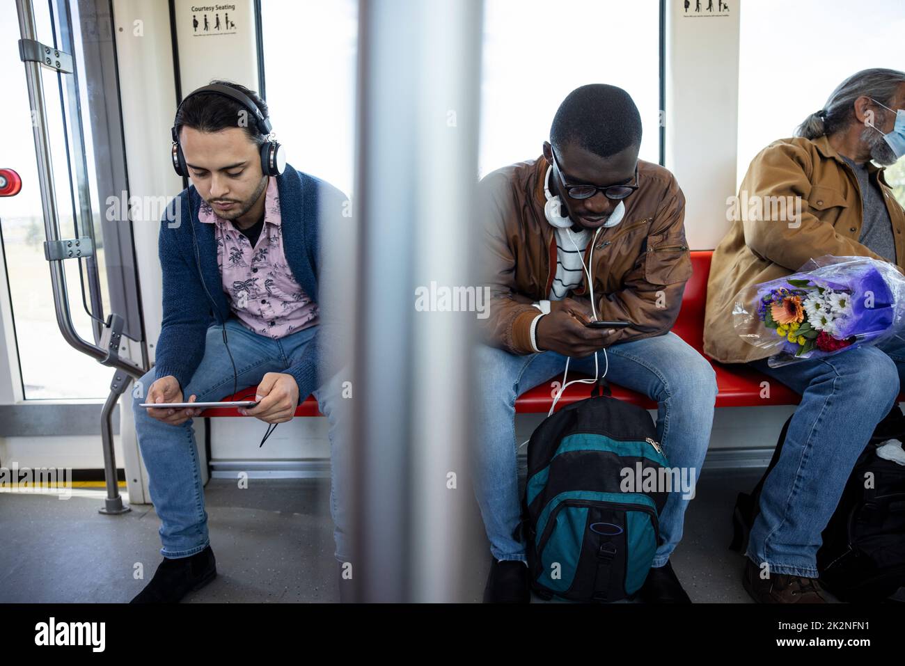 Male train passengers hi-res stock photography and images - Alamy