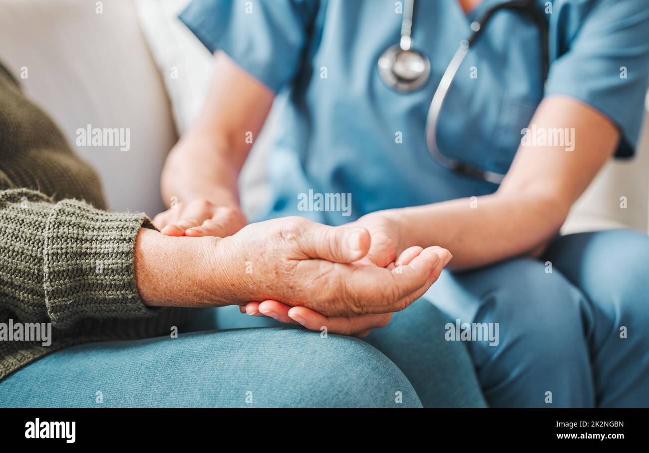 Female doctor checking pulse hi-res stock photography and images - Alamy