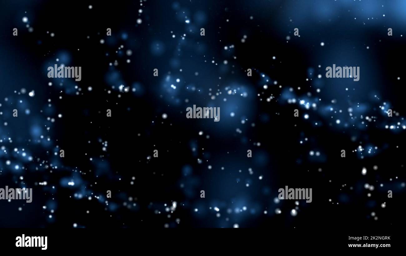 Blue dust particles floating over black Stock Photo - Alamy