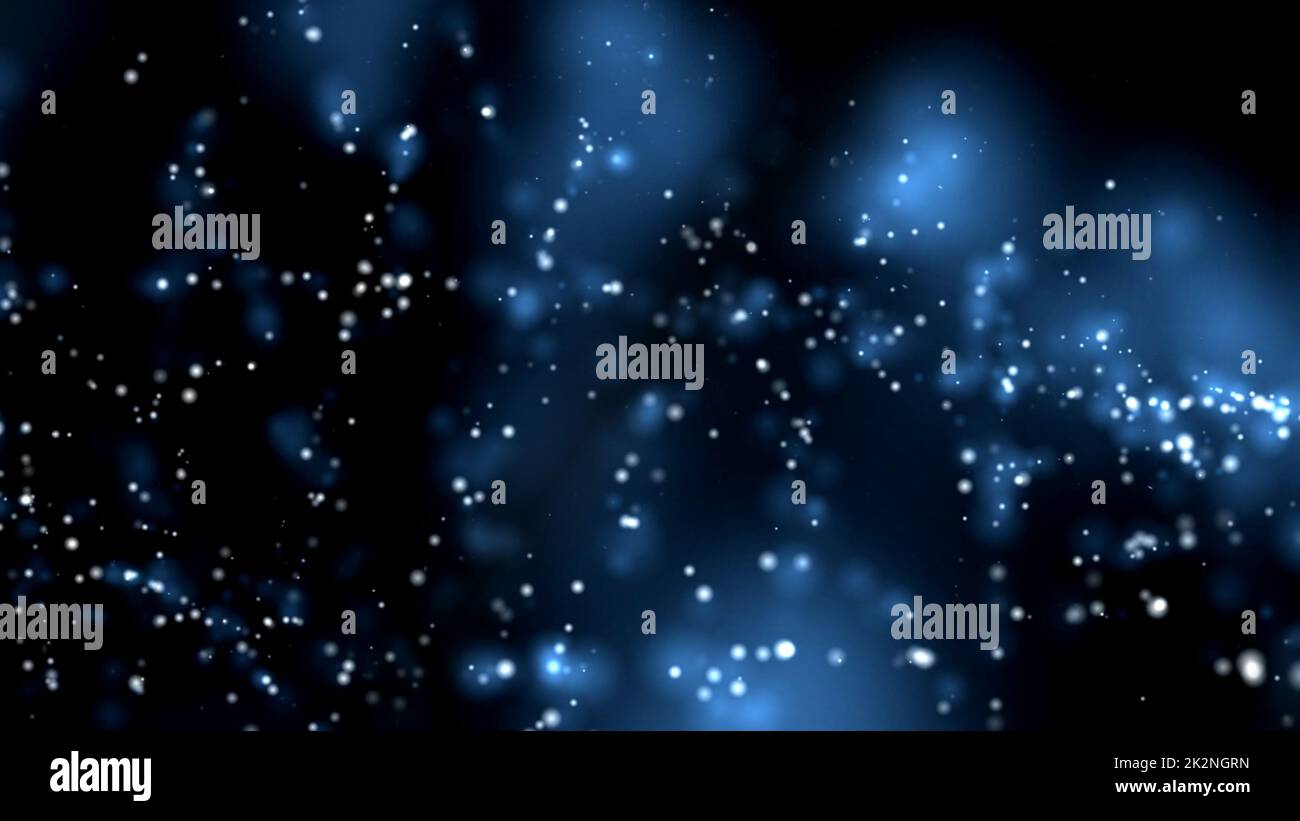 Blue dust particles floating over black Stock Photo - Alamy
