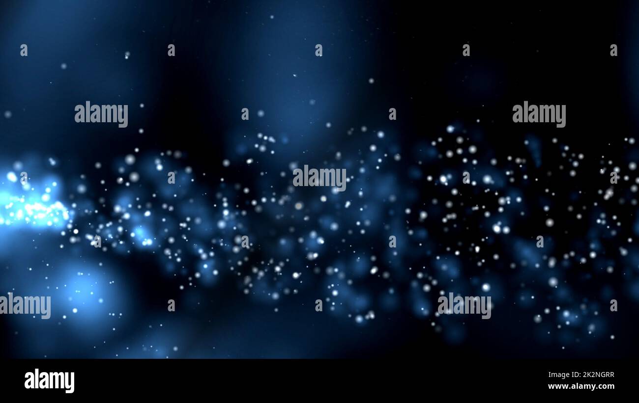 Blue dust particles floating over black Stock Photo - Alamy