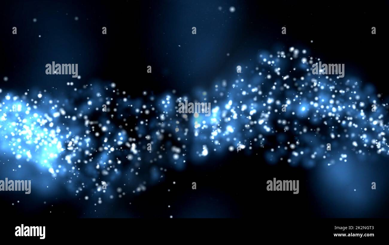 Blue dust particles floating over black Stock Photo - Alamy