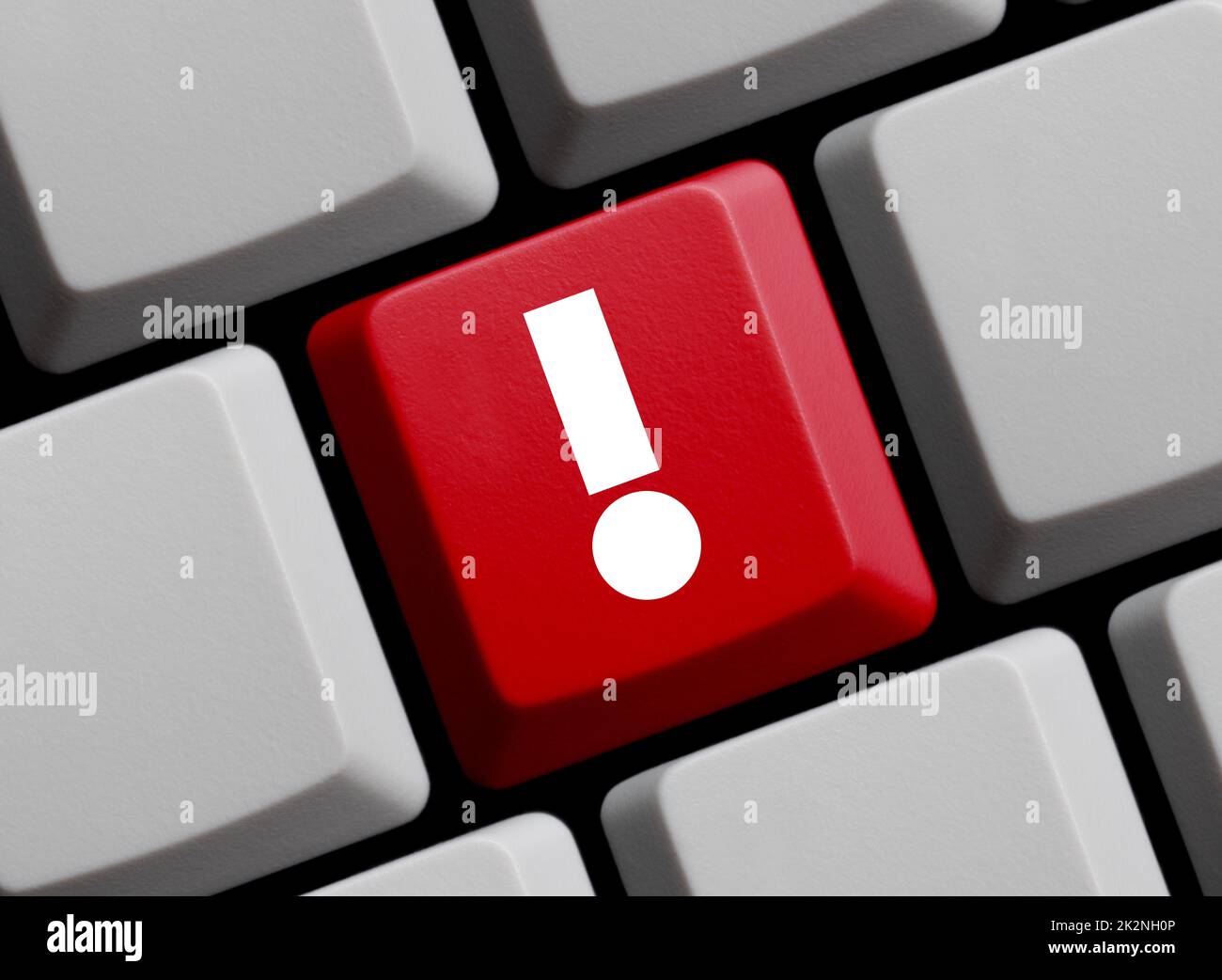 White Exclamation Mark on red computer keyboard Stock Photo - Alamy