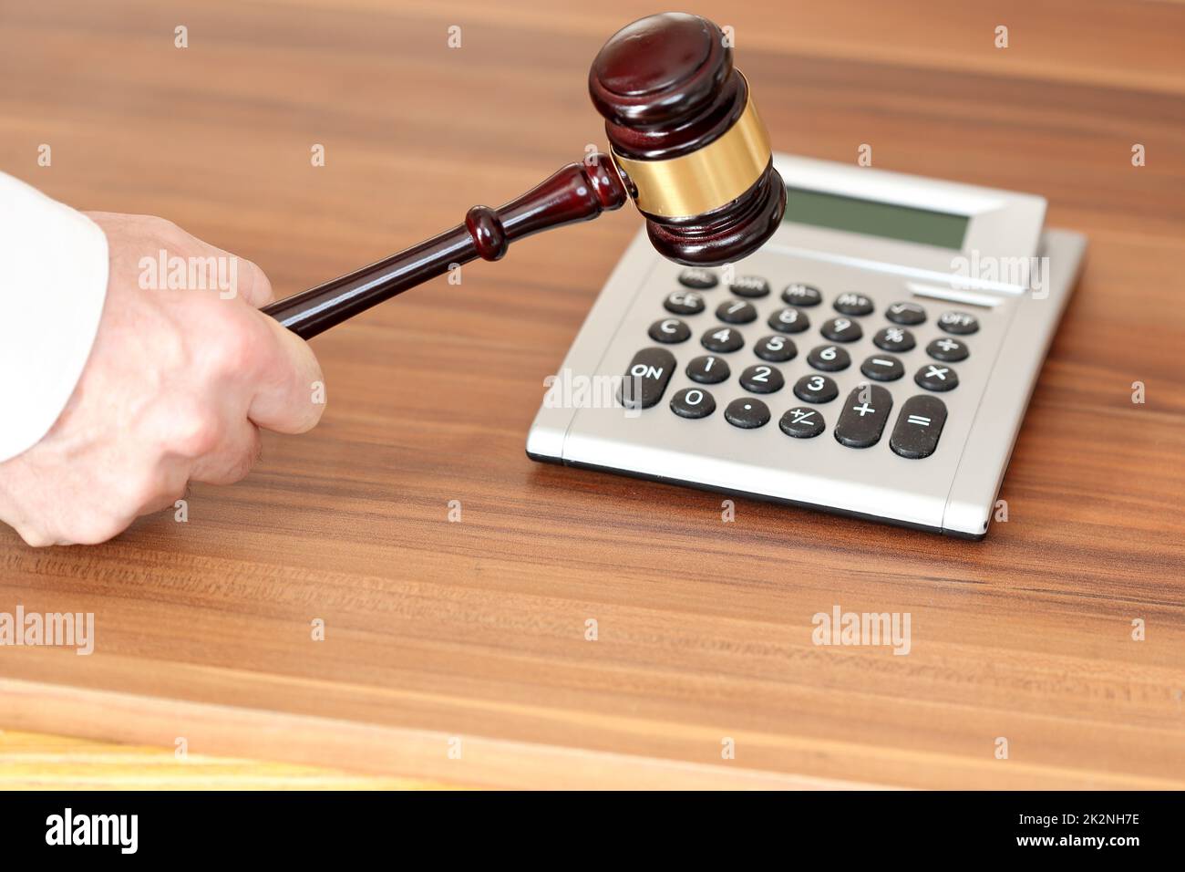 auction symbol with calculator and gavel on background Stock Photo - Alamy