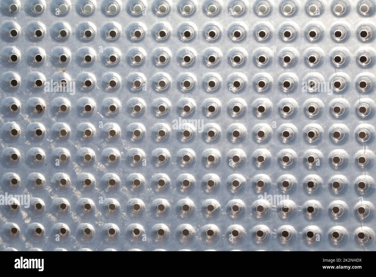 perforated transparent opaque plastic background texture Stock Photo ...