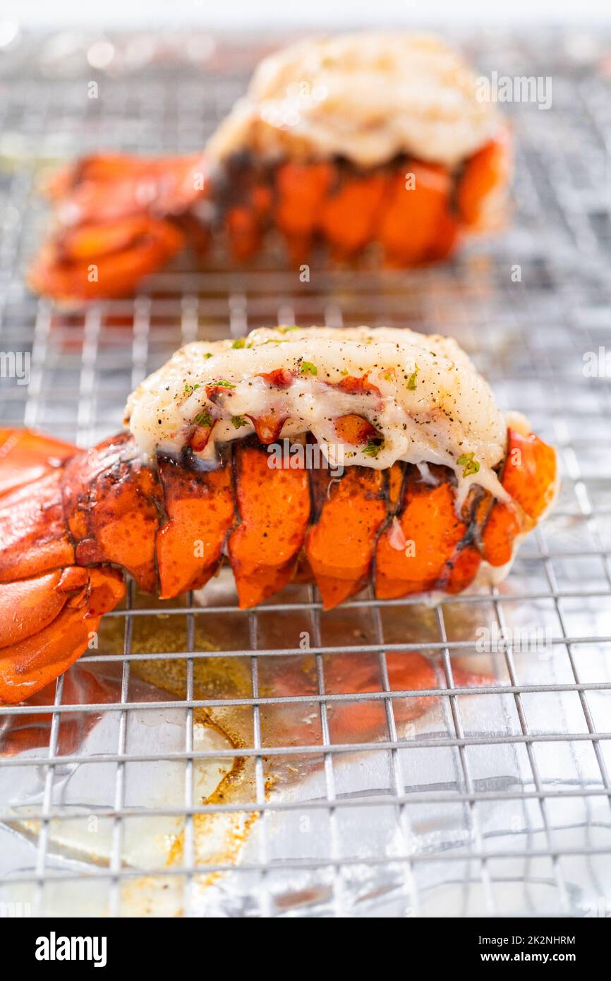 Garlic lobster tails Stock Photo - Alamy