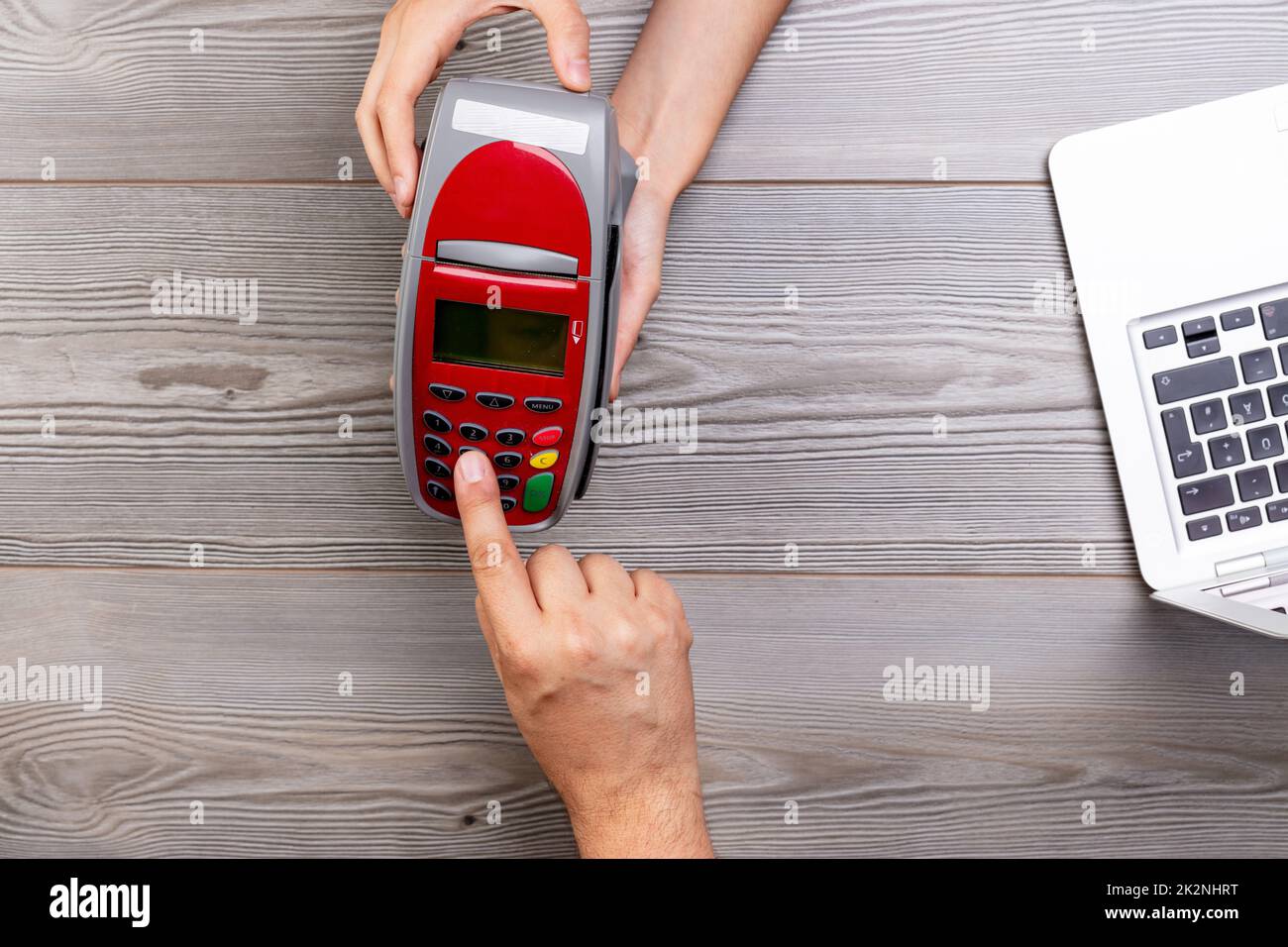 customer dialing pin code on payment terminal Stock Photo - Alamy