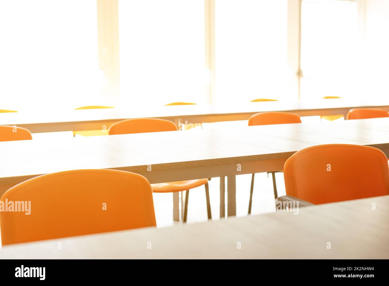 Bright conference room and empty tables and chairs Stock Photo - Alamy
