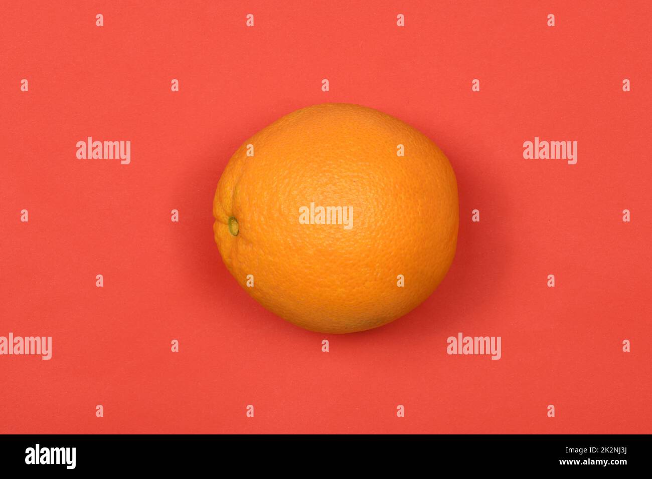 Perfectly retouched orange isolated on red. High resolution photo. Full ...