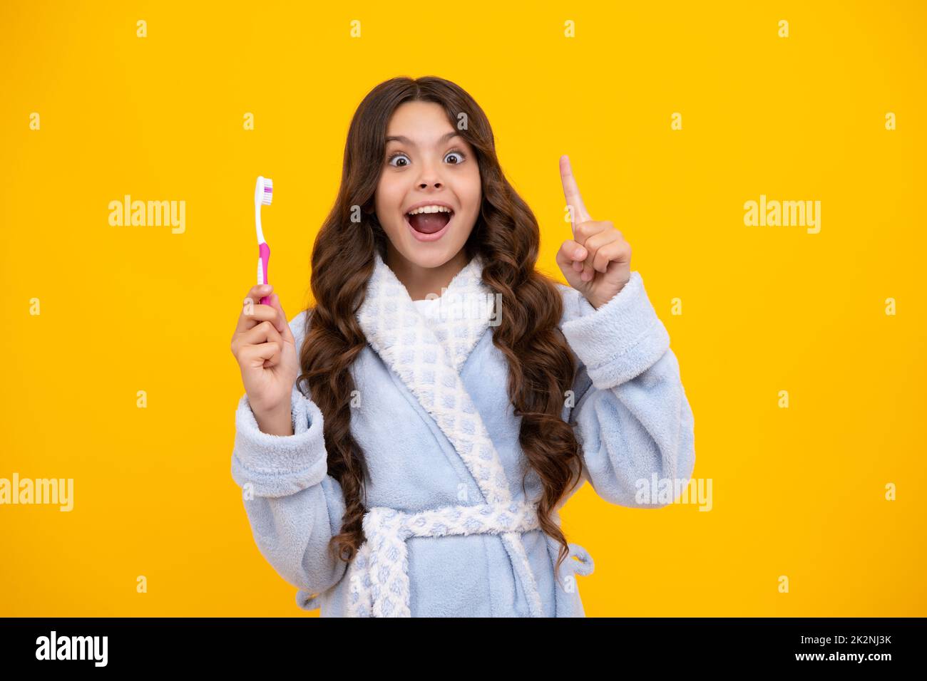 Amazed Teen Girl Oral Hygiene Dental Teenage Girl Brushing Her Teeth Teen Holds A Toothbrush