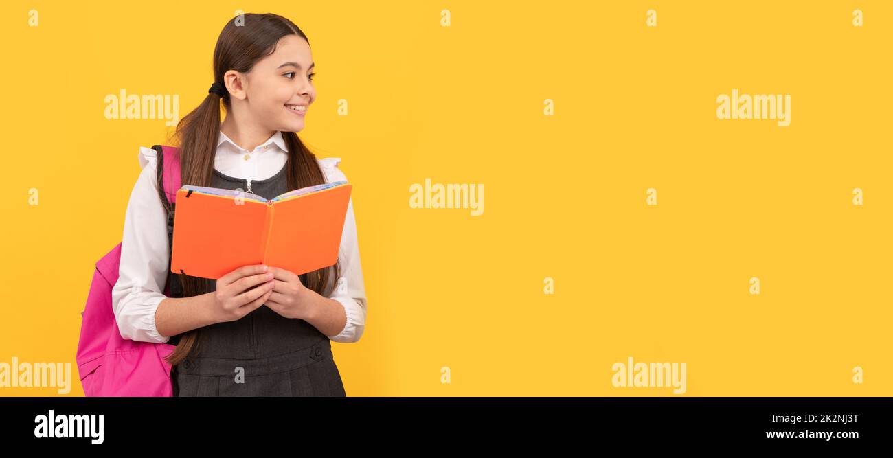 Learning for life. Happy children read books yellow background ...