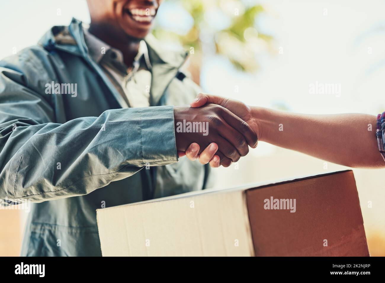 Hand shaking customer hi-res stock photography and images - Alamy