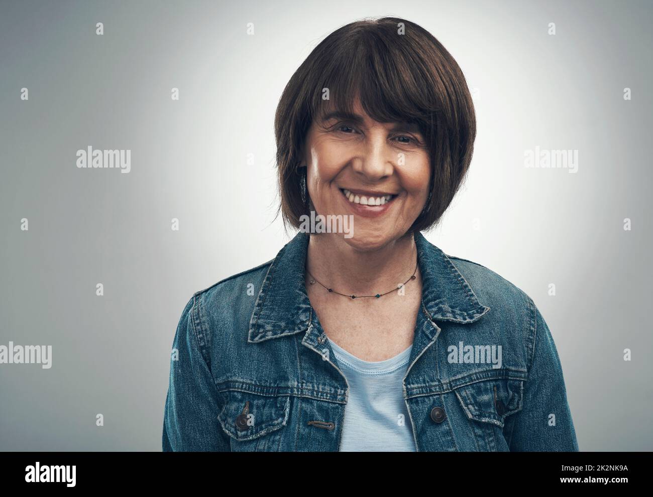 Simplicity makes me happy. Studio portrait of a senior woman standing ...