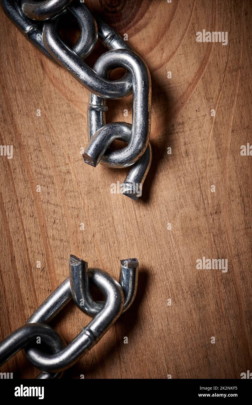Chains and breaking hi-res stock photography and images - Alamy