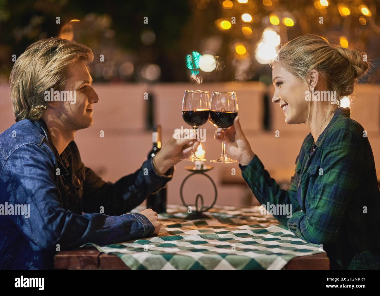 Romantic couple making toast outdoors hi-res stock photography and ...