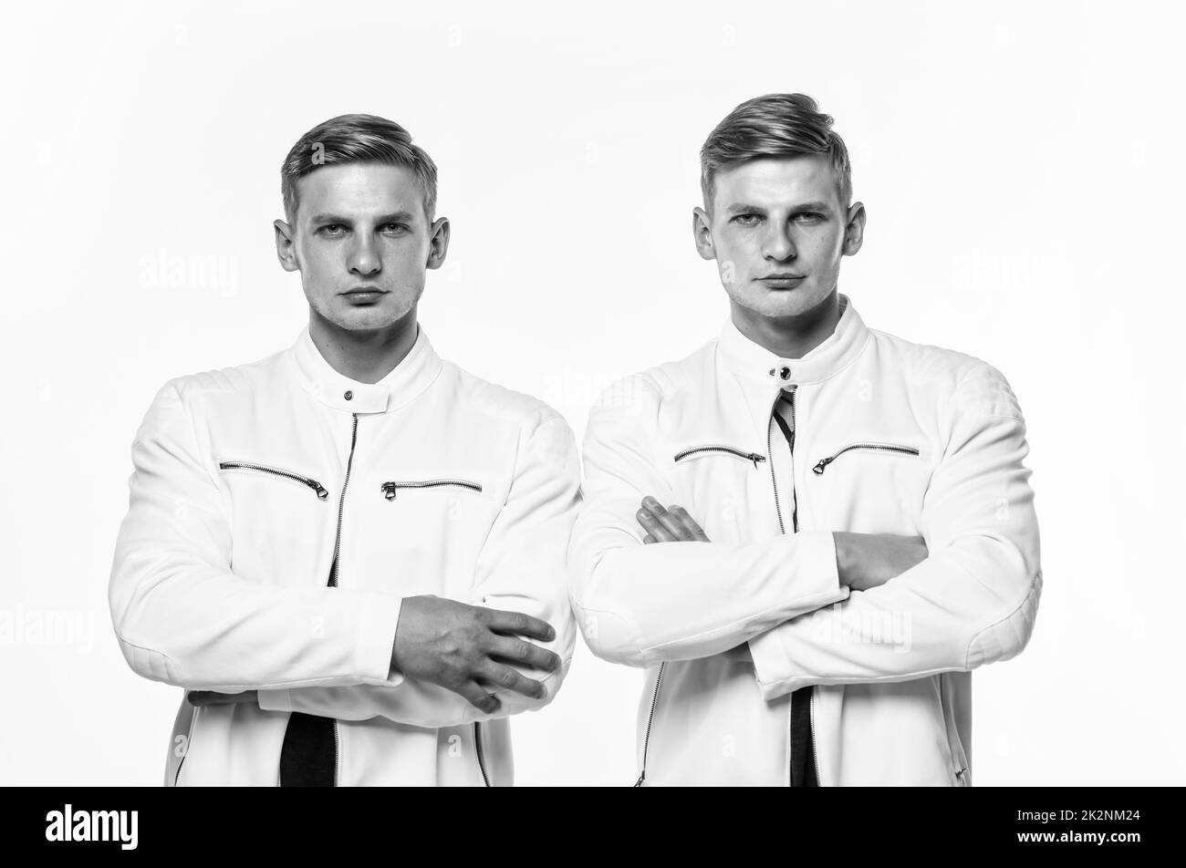 twin brothers men in white casual clothes look alike, male fashion ...