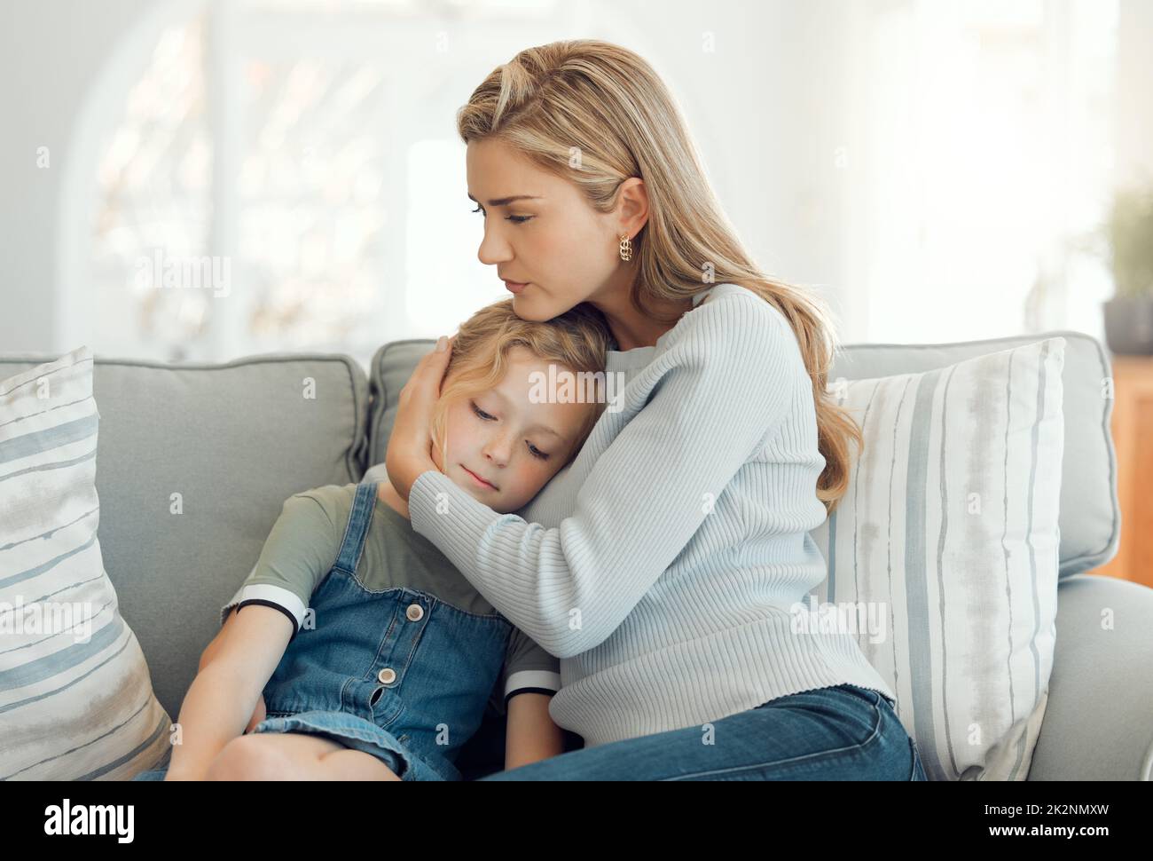 Adult daughter comforting her mother hi-res stock photography and images - Alamy