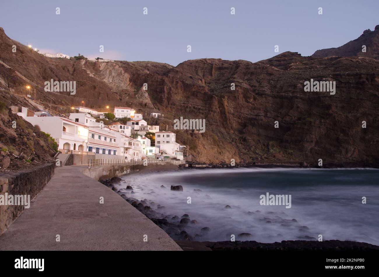 Alojera Beach at sunset Stock Photo - Alamy