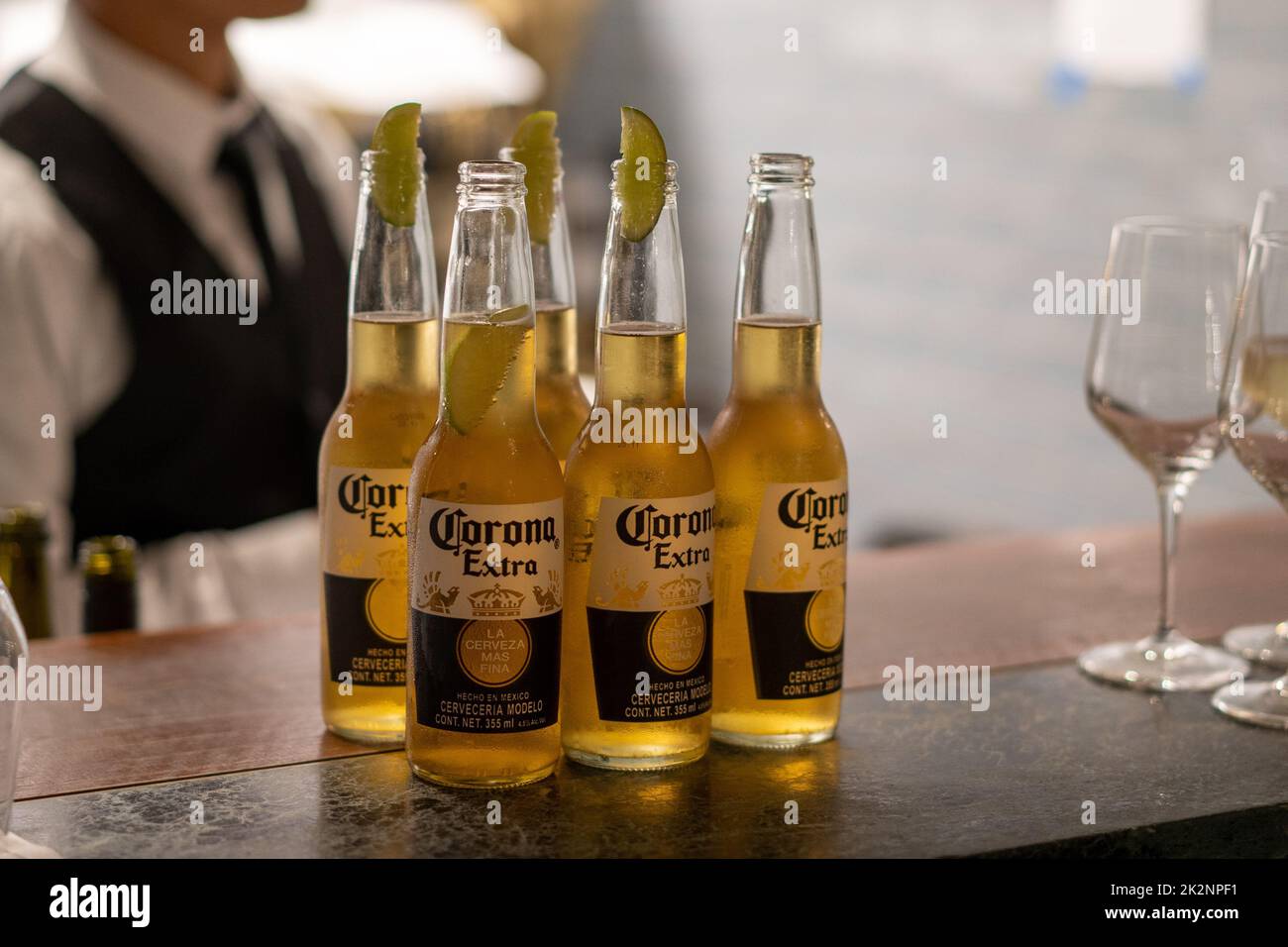A closeup shot of ice cold Corona beer bottles on a table Stock Photo ...