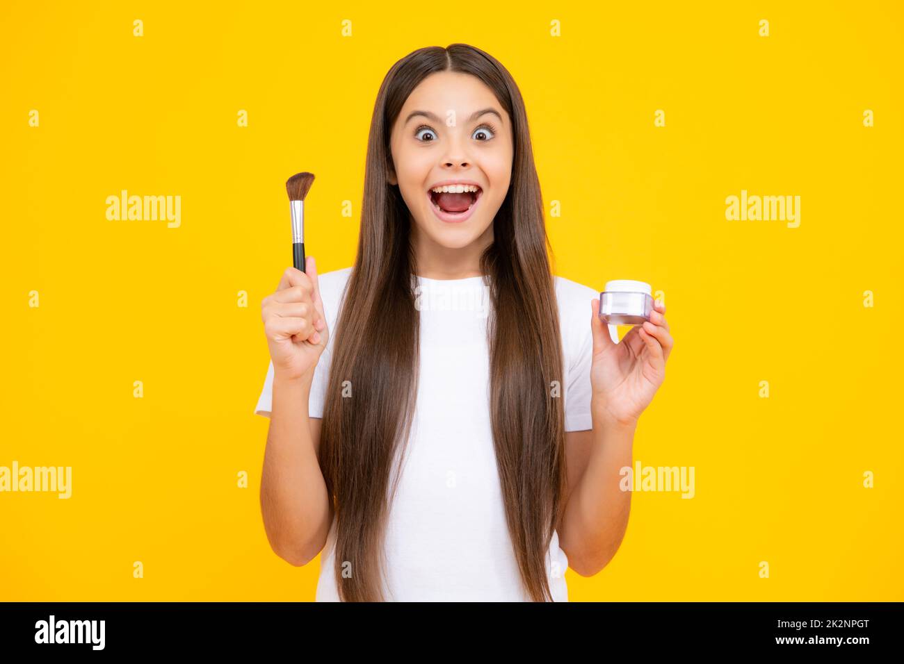 Beauty, make up and kids cosmetics. Teenage child girl with brush ...