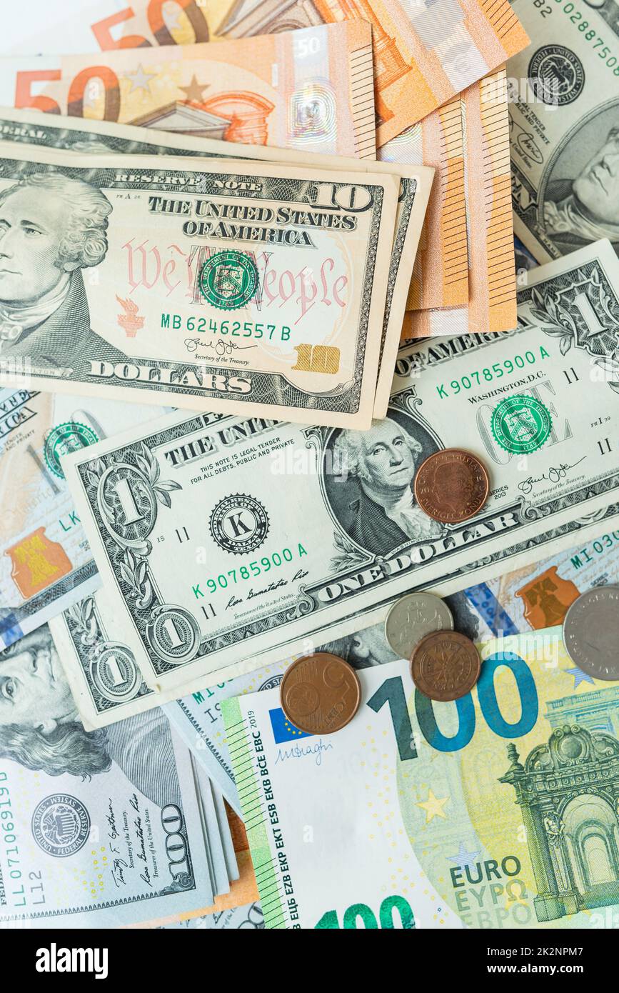 Multicurrency banknotes, coins. The concept of the world economy during ...