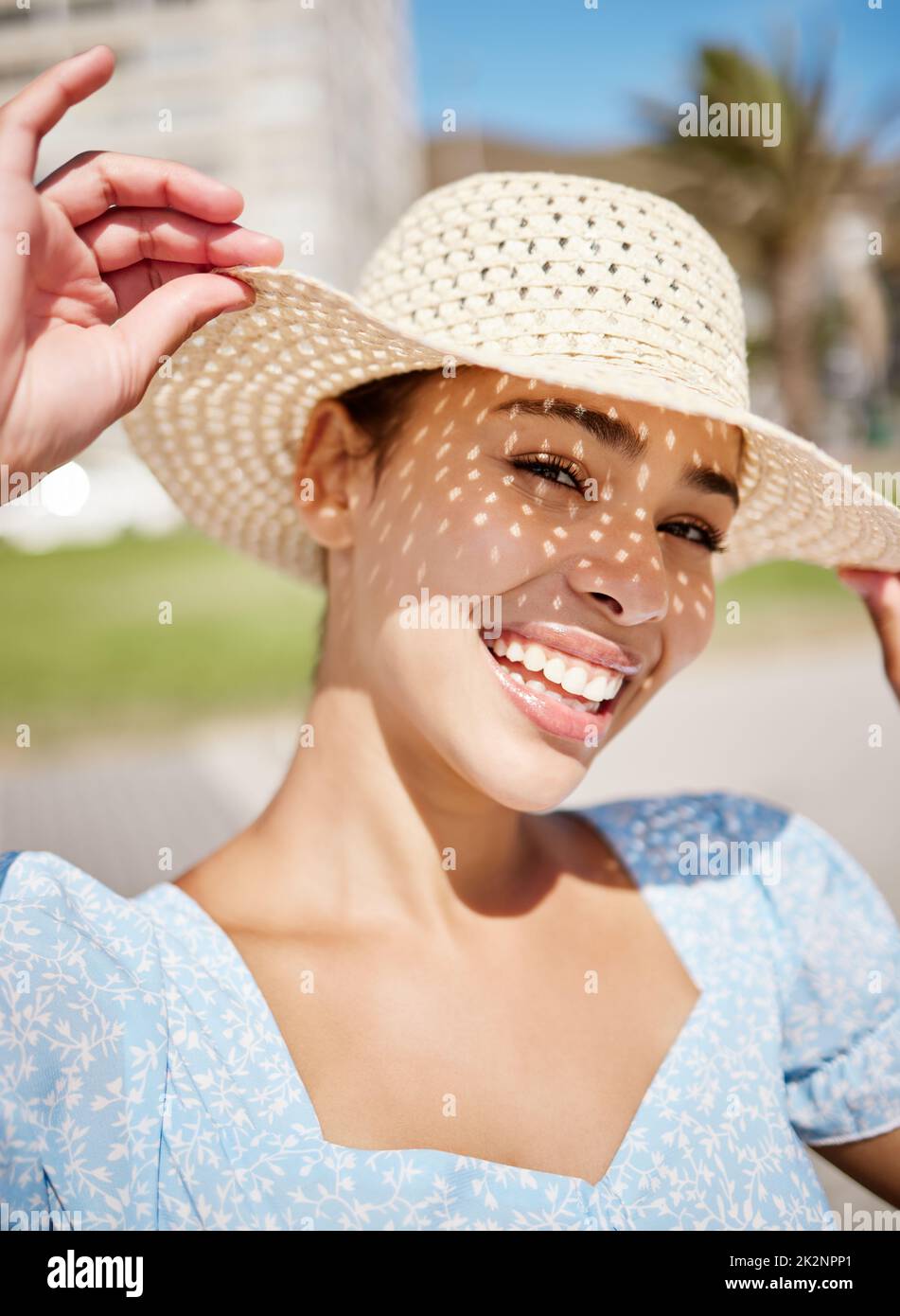 Happy, summer and a woman on holiday with hat and smile on face in the ...
