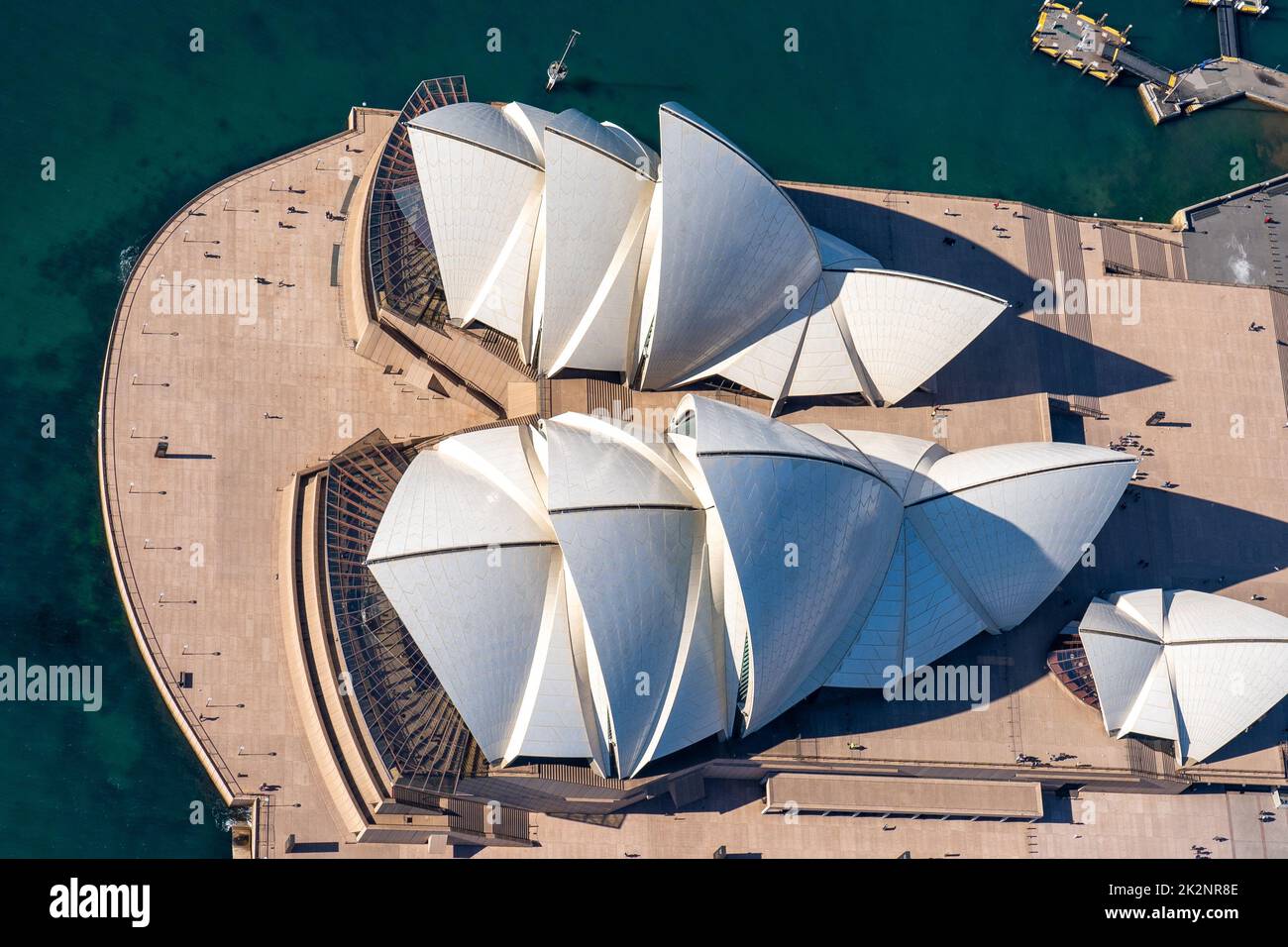 An aerial view of Sydney Opera house surrounded by water Stock Photo ...