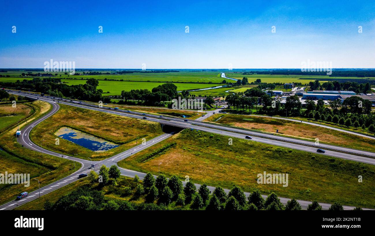 An aerial view of the traffic on A32 highway near Heerenveen town in ...