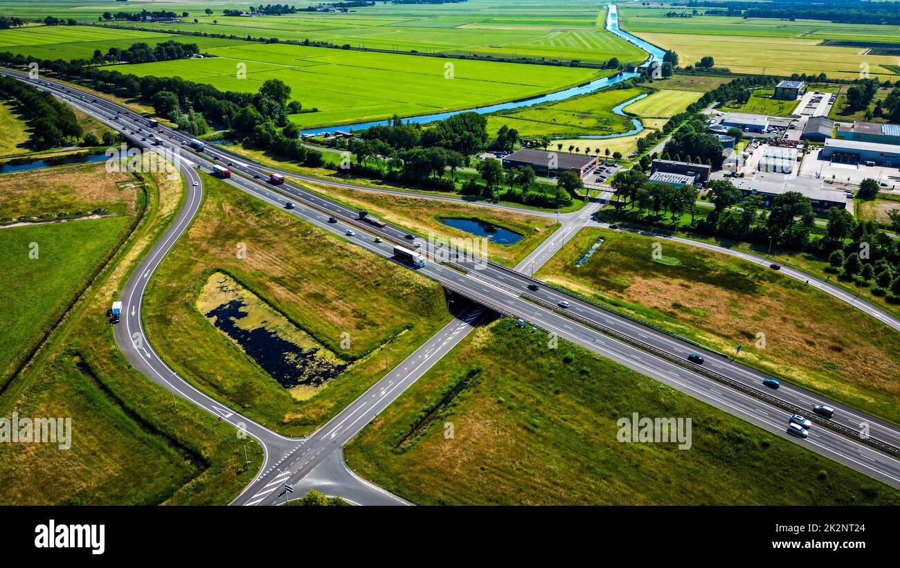 An aerial view of the traffic on A32 highway near Heerenveen town in ...